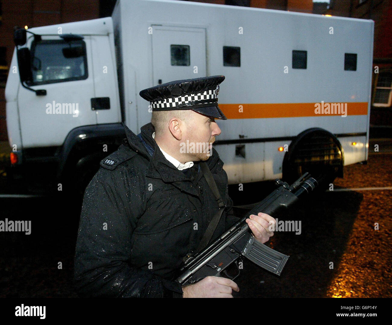 A Policeman stands guard as David Beiber also known Nathan Wayne ...