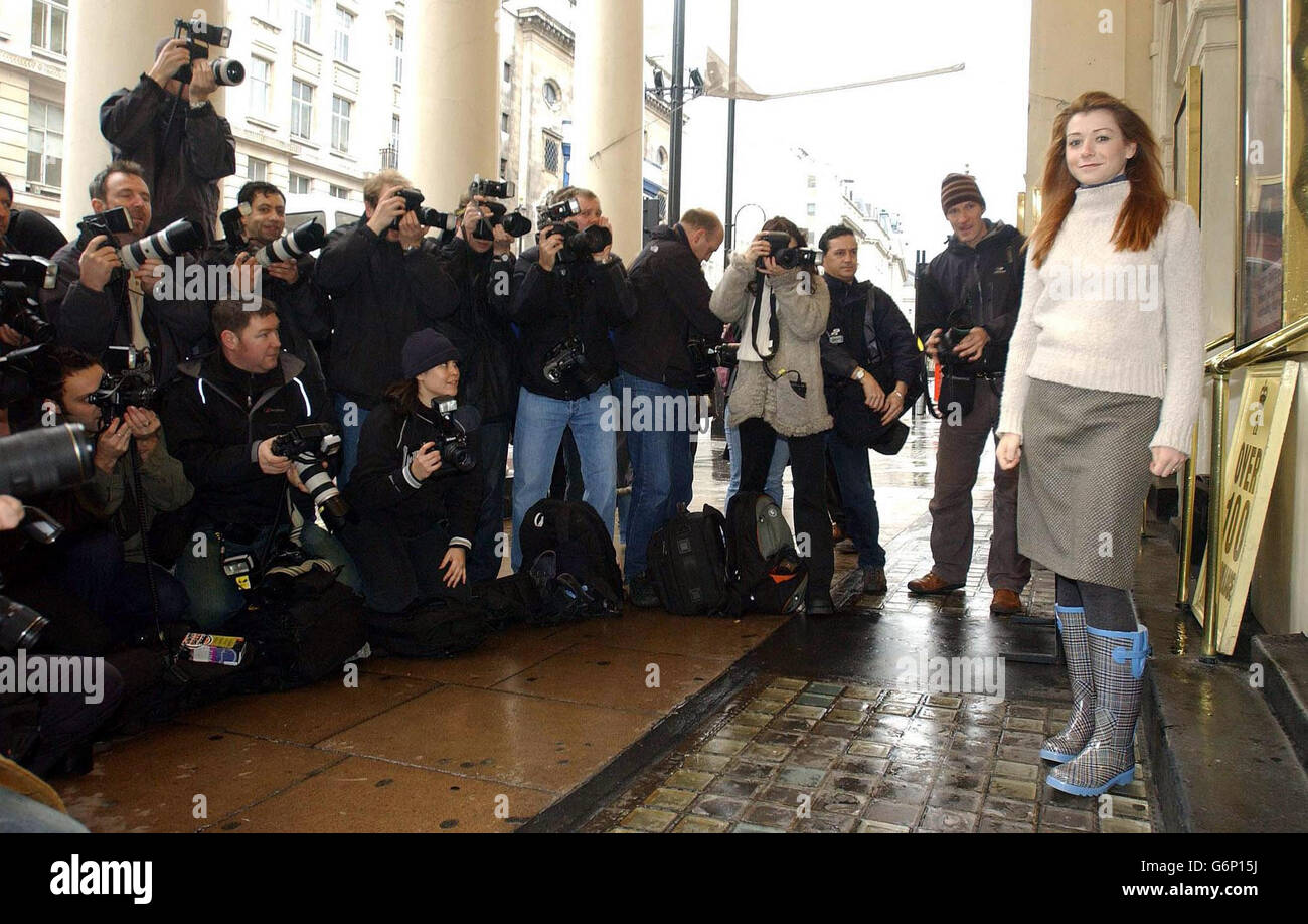 Actress Alyson Hannigan poses for photographers during a photocall and ...