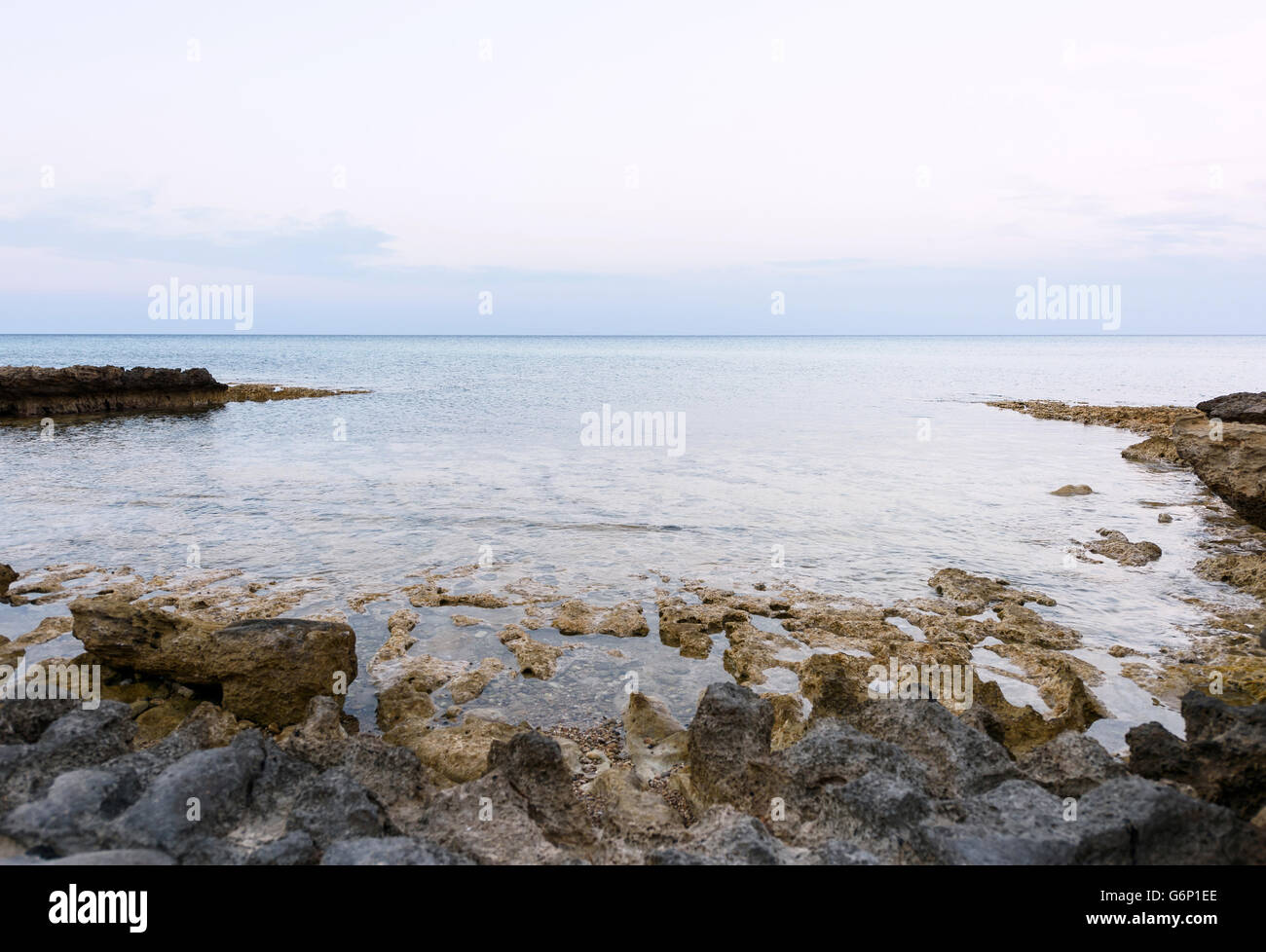 Photo of sea in protaras, cyprus island with rocks at sunset Stock ...