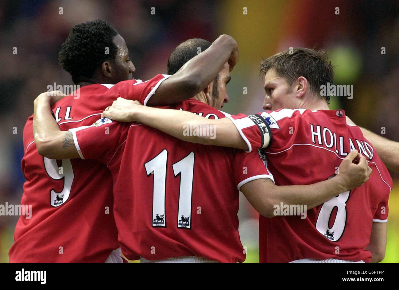 Charlton's Jason Euell (far left) celebrates his first half goal ...