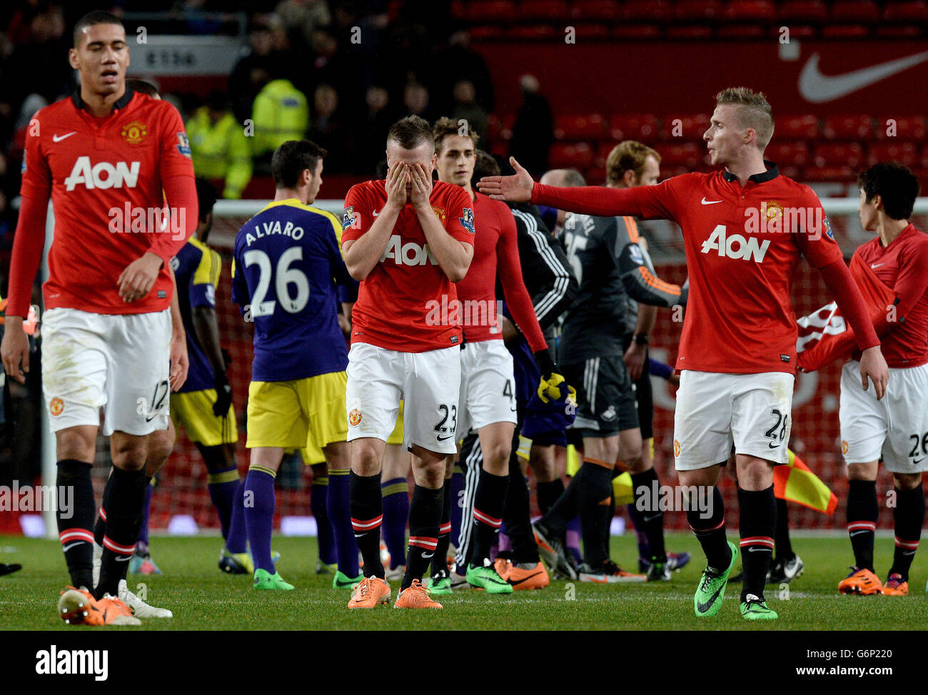 Manchester United's (left to right) Chris Smalling Tom Cleverley and ...