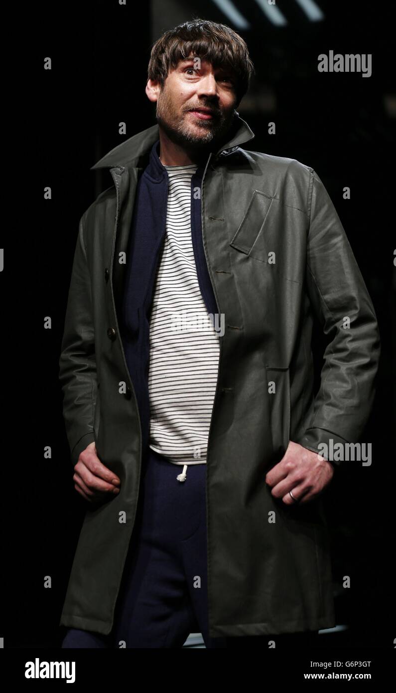 Alex James (bassist from Blur) appears on the catwalk during the Oliver ...