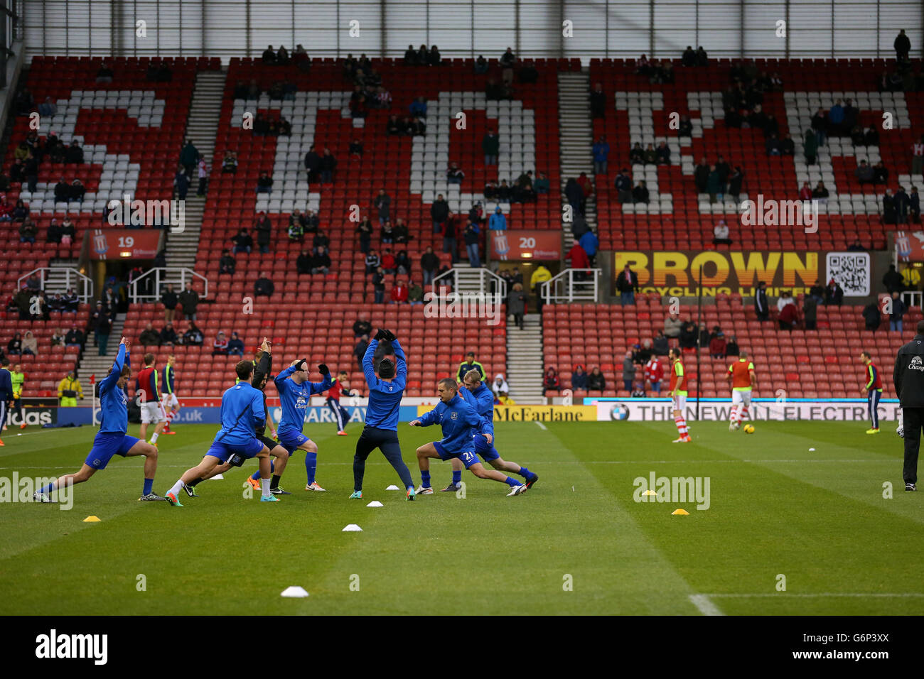 General view of the football stadium as players warm up hi-res stock ...