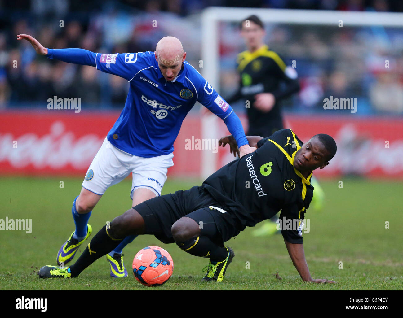 Macclesfield Town's Danny Whittaker (left) gets away from Sheffield ...