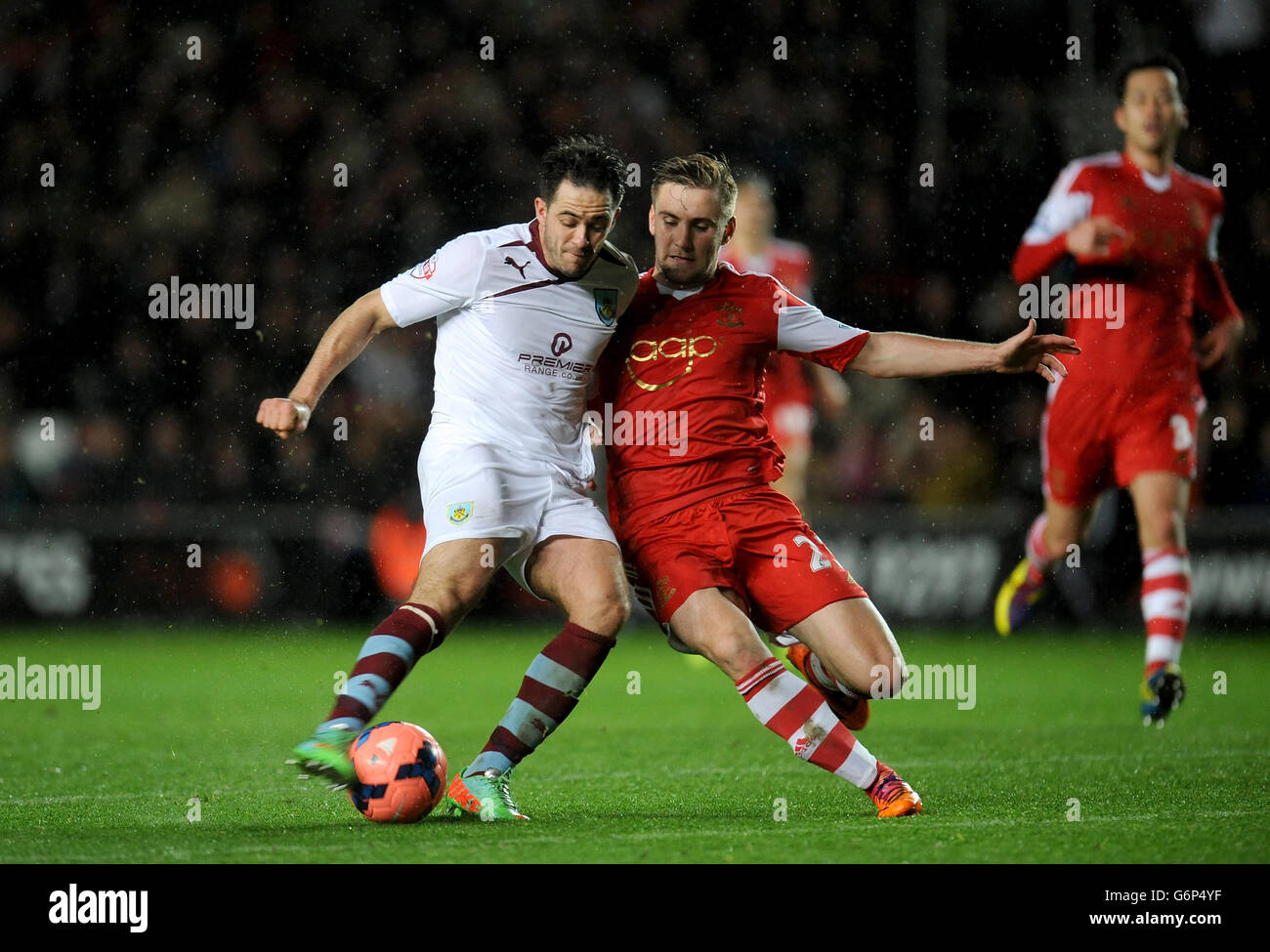 Burnley's Danny Ings (left) and Southampton's Luke Shaw battle for the ...