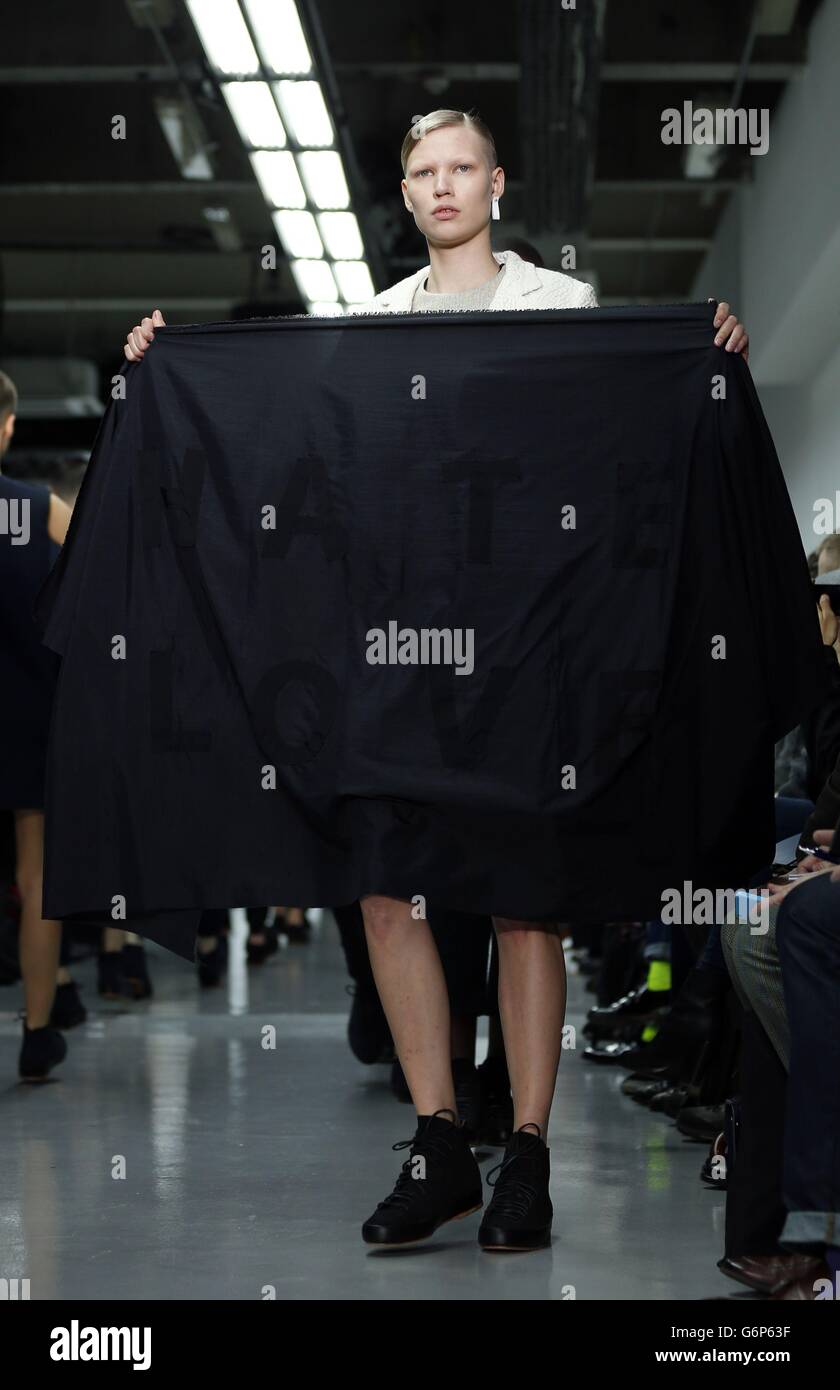 Models appear on the catwalk during the Matthew Miller show at London ...