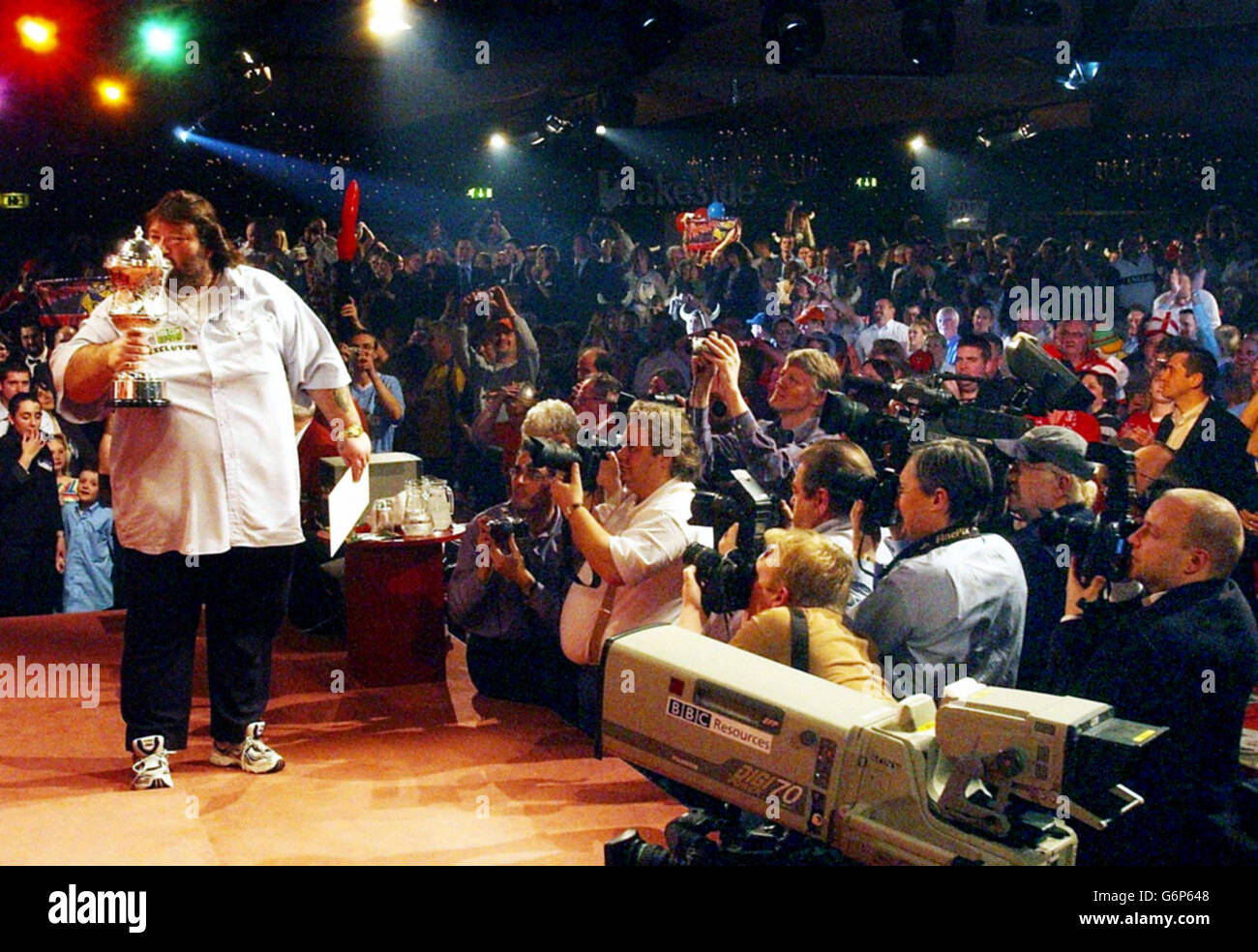 England's Andy Fordham kisses the trophy after winning the Final of the ...
