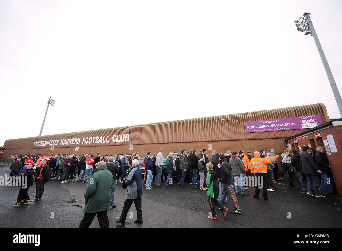 Supporters queue at the turnstiles of aggborough stadium the match hi ...