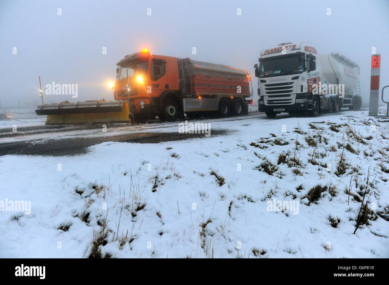 A snow plough clears the A66 in County Durham, following overnight snow ...