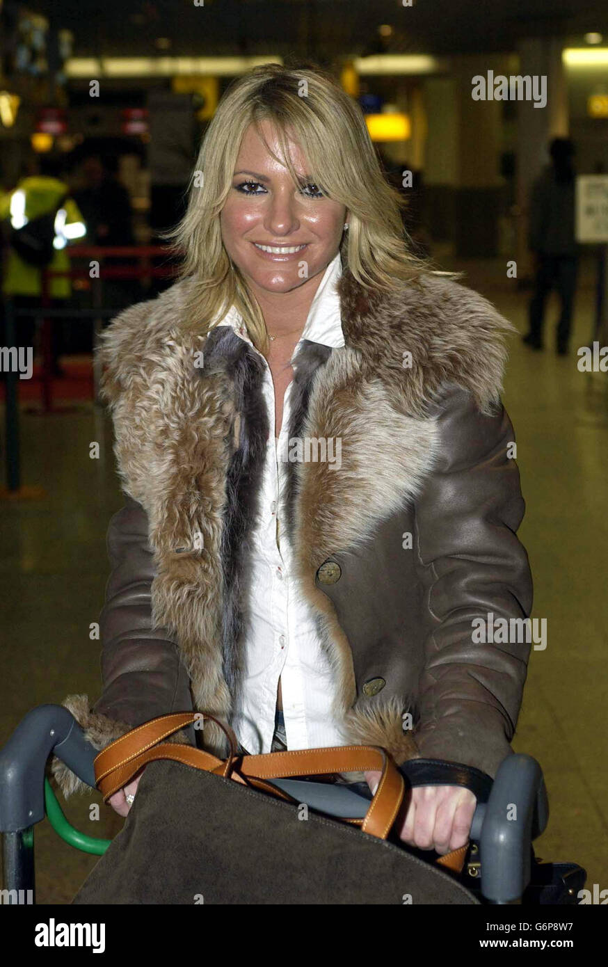 Alex Best arrives at Heathrow Airport Stock Photo - Alamy
