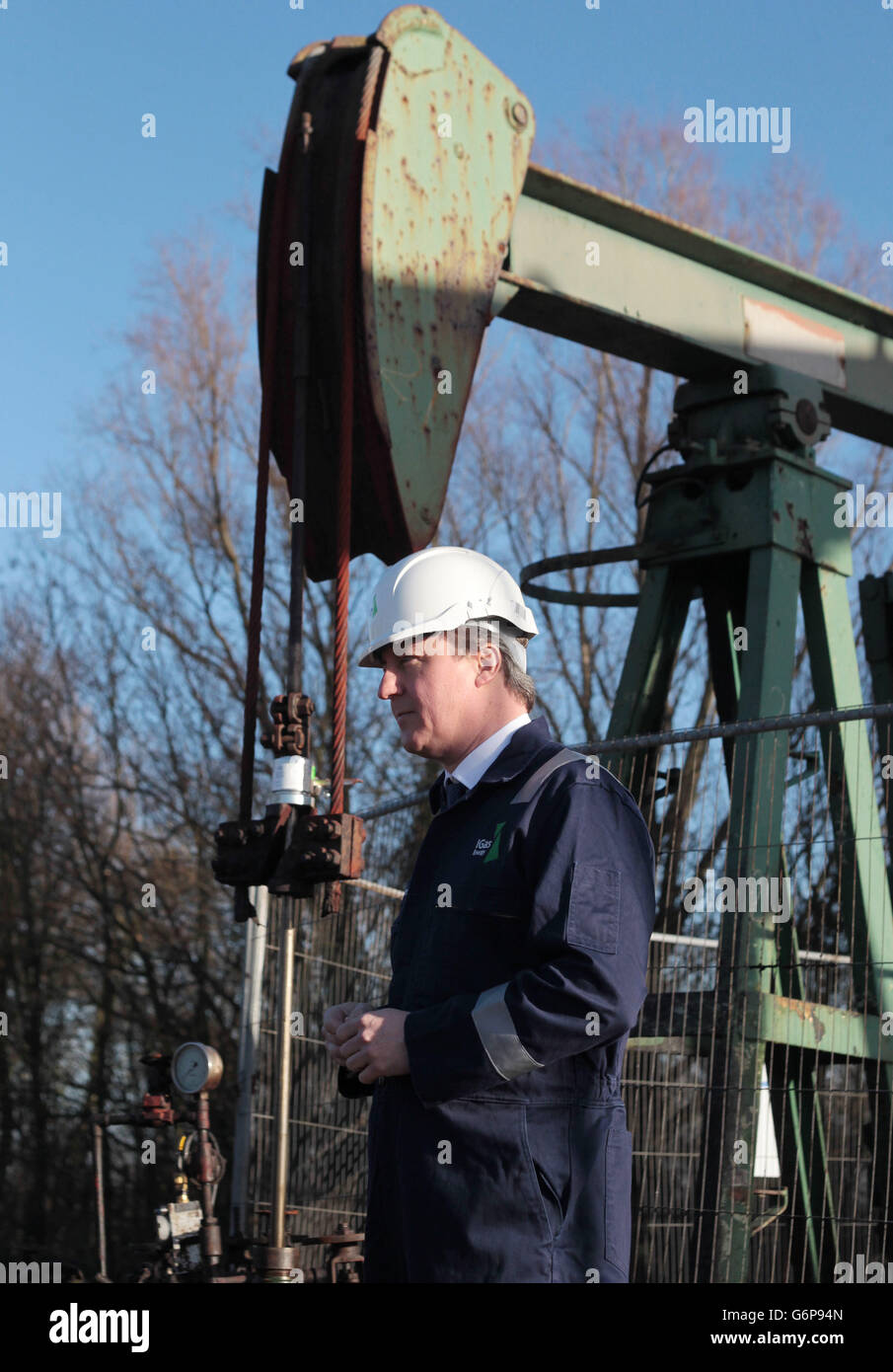 Prime Minister David Cameron looks on during a guided tour of the IGas ...