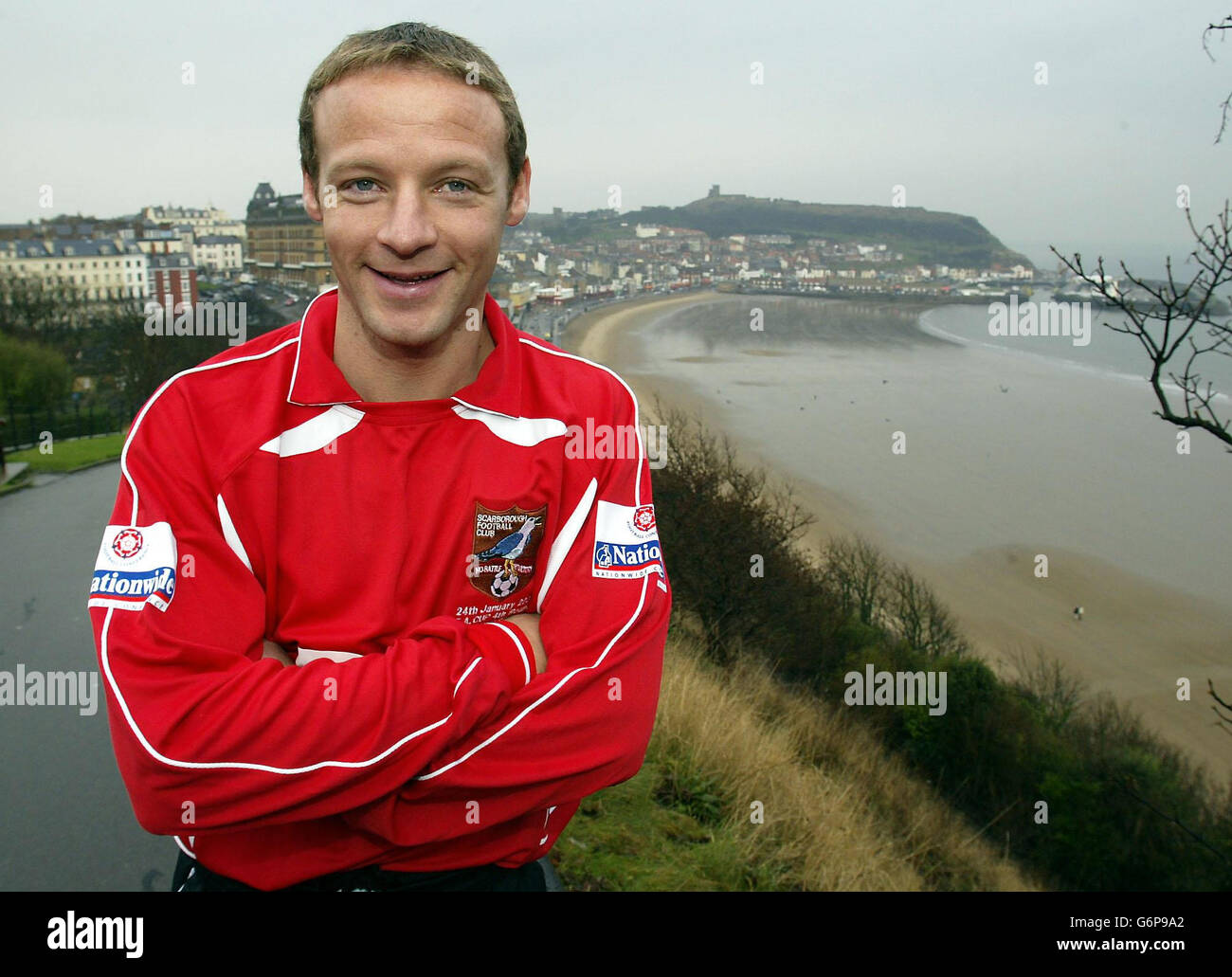 Scarborough captain Jimmy Kelly stands by the town's South Cliff ...
