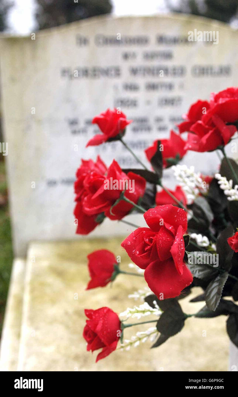 A floral tribute of red roses is left on a grave in the St Pancras ...