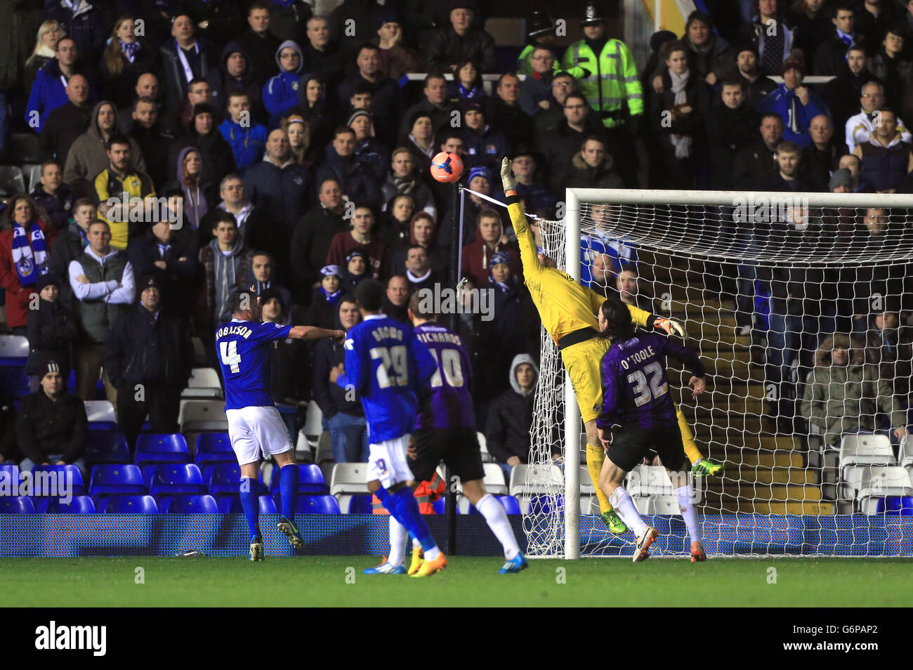 Birmingham City's Paul Robinson (left) scores the opening goal with a ...