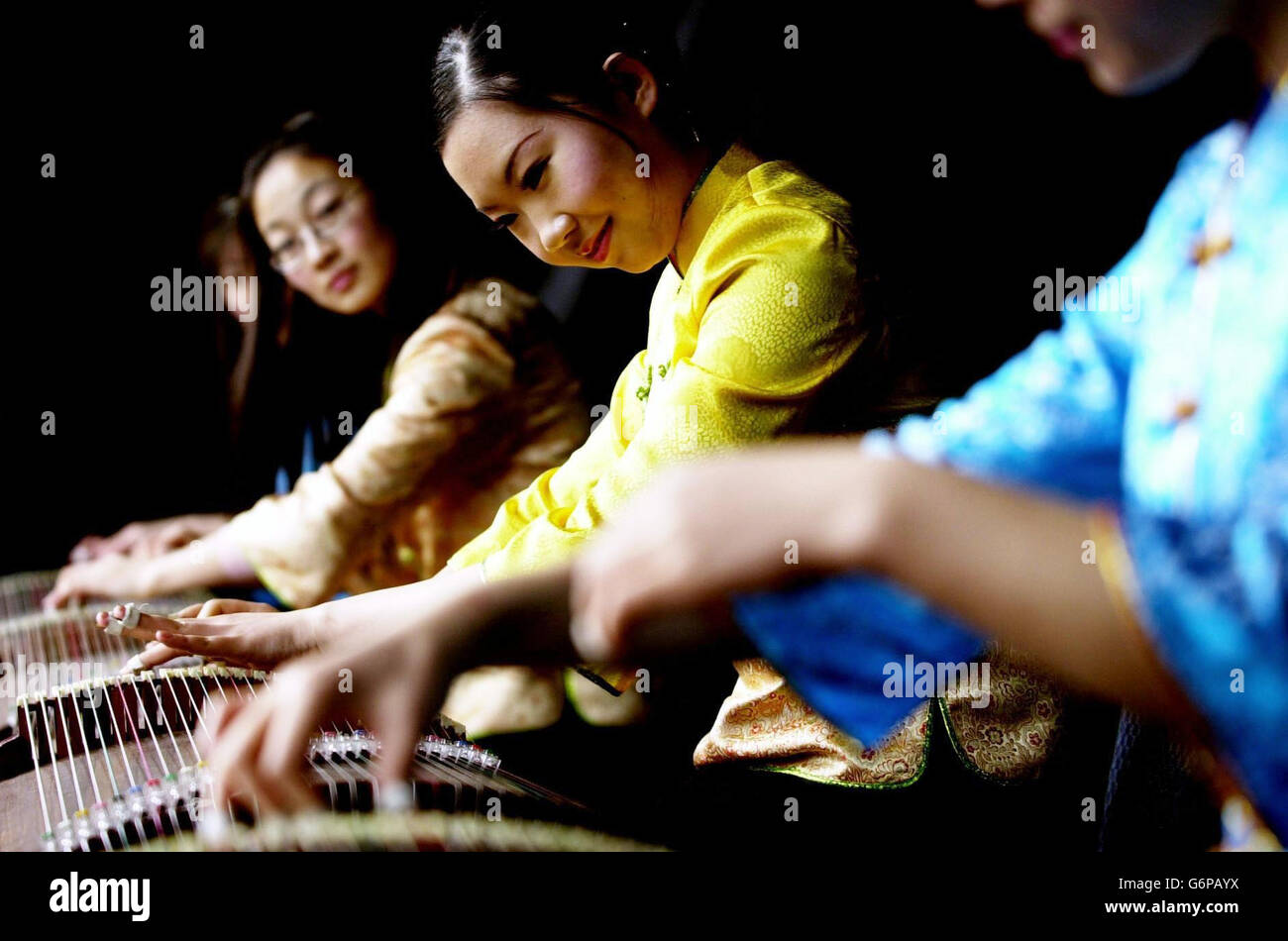 Chinese ladies beijing pluck strings traditional oriental instrument hi ...