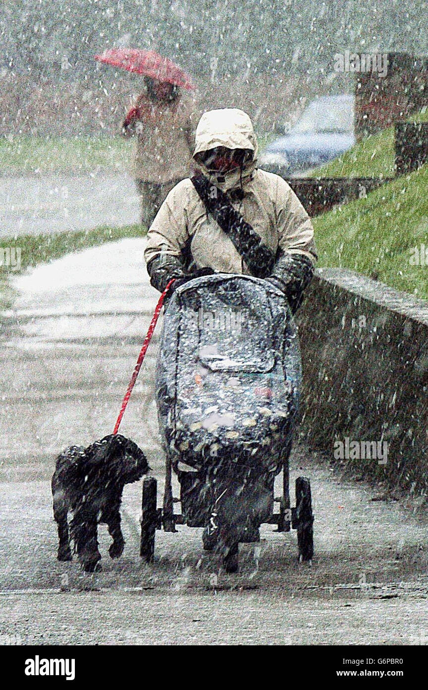 A person battles through the blizzard in Scarborough, North Yorkshire ...