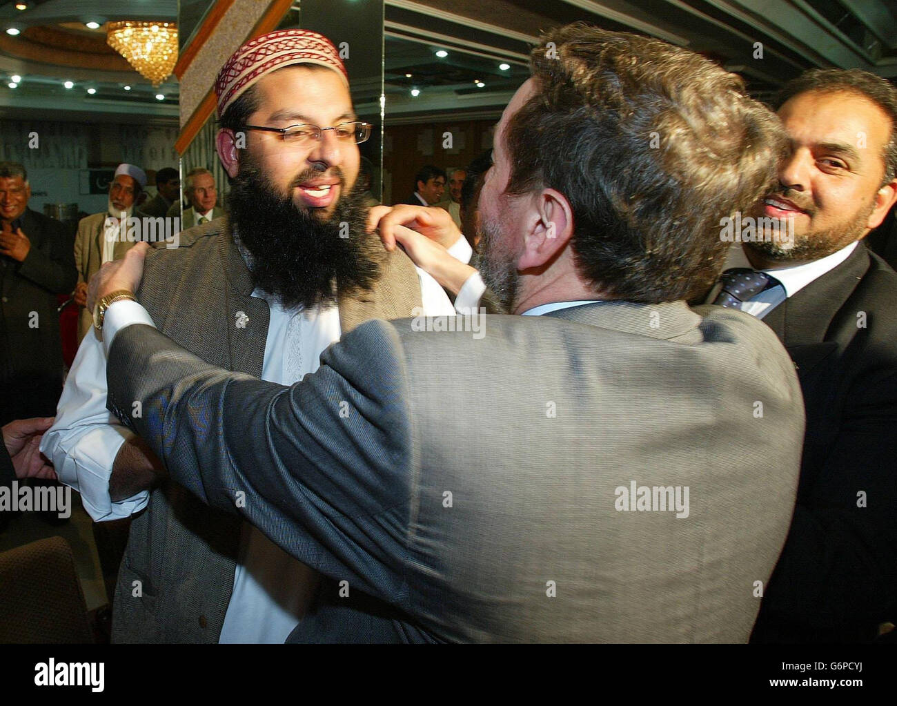 Lord Ahmed (right) tries in intervene as a Sheffield curry restaurant ...