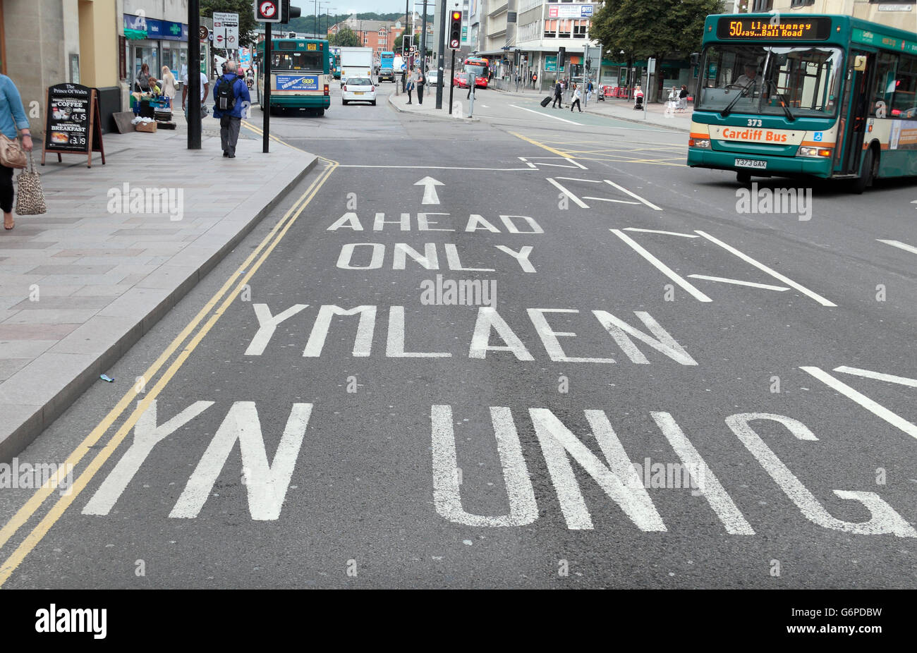 Dual language (English/Welsh) road markings "Ahead Only" & "Ymlaen Tn ...