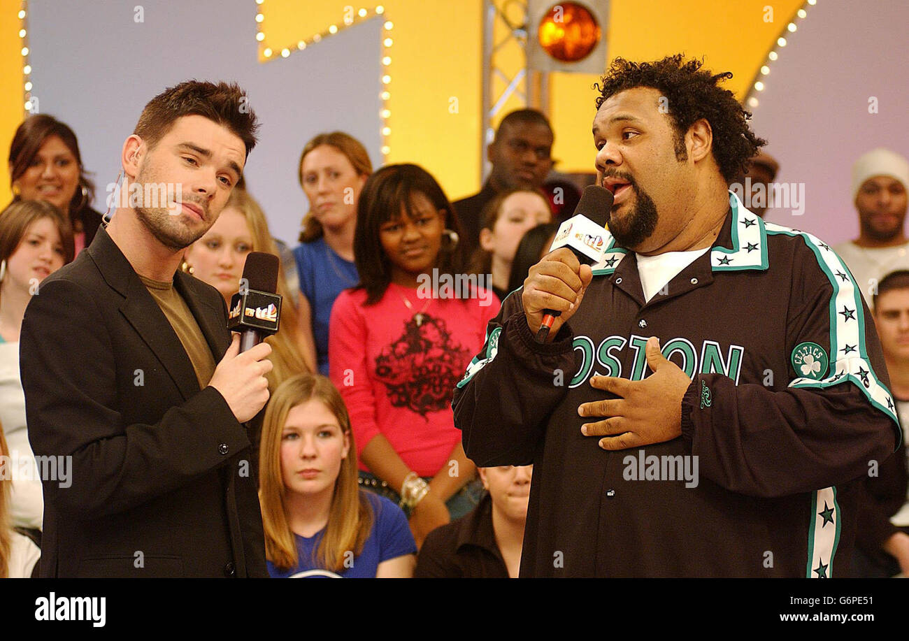 MTV presenter Dave Berry (left) talks to rapper Fatman Scoop during his ...