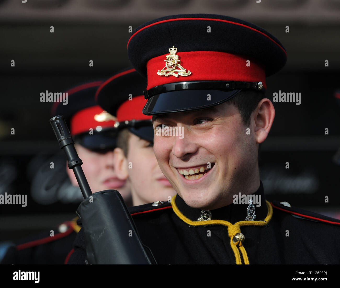 Members of the 1st Regiment Royal Horse Artillery share a joke before ...