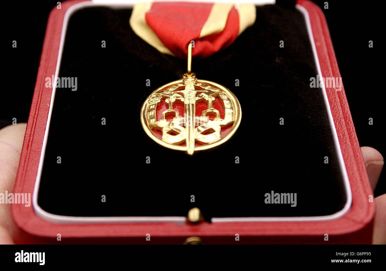 Proudly displays knights bachelor medal hi-res stock photography and ...