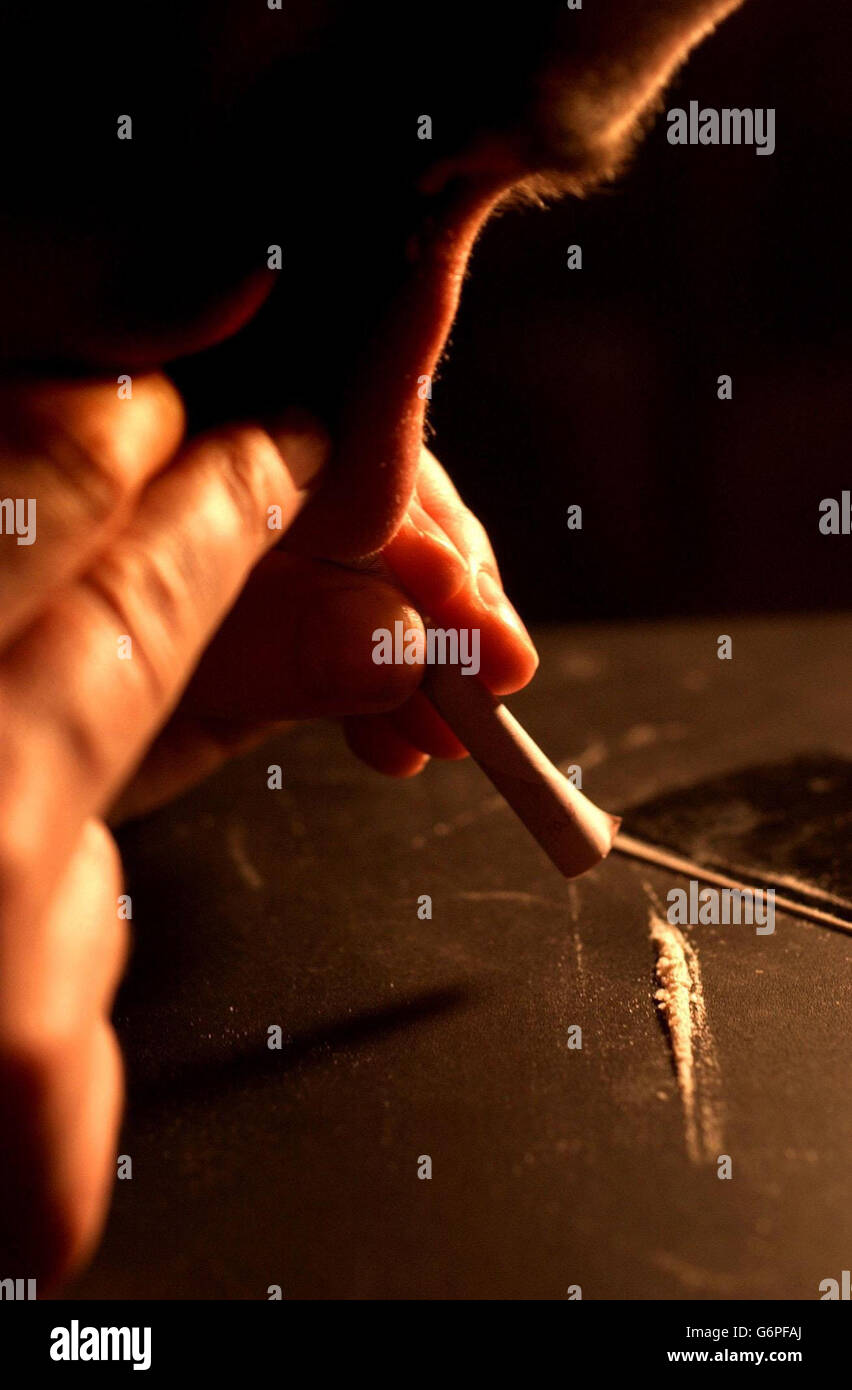 A person snorting cocaine Stock Photo - Alamy