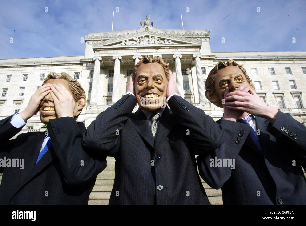 SDLP Lord Mayor of Belfast, Martin Morgan (centre) wears a Tony Blair ...