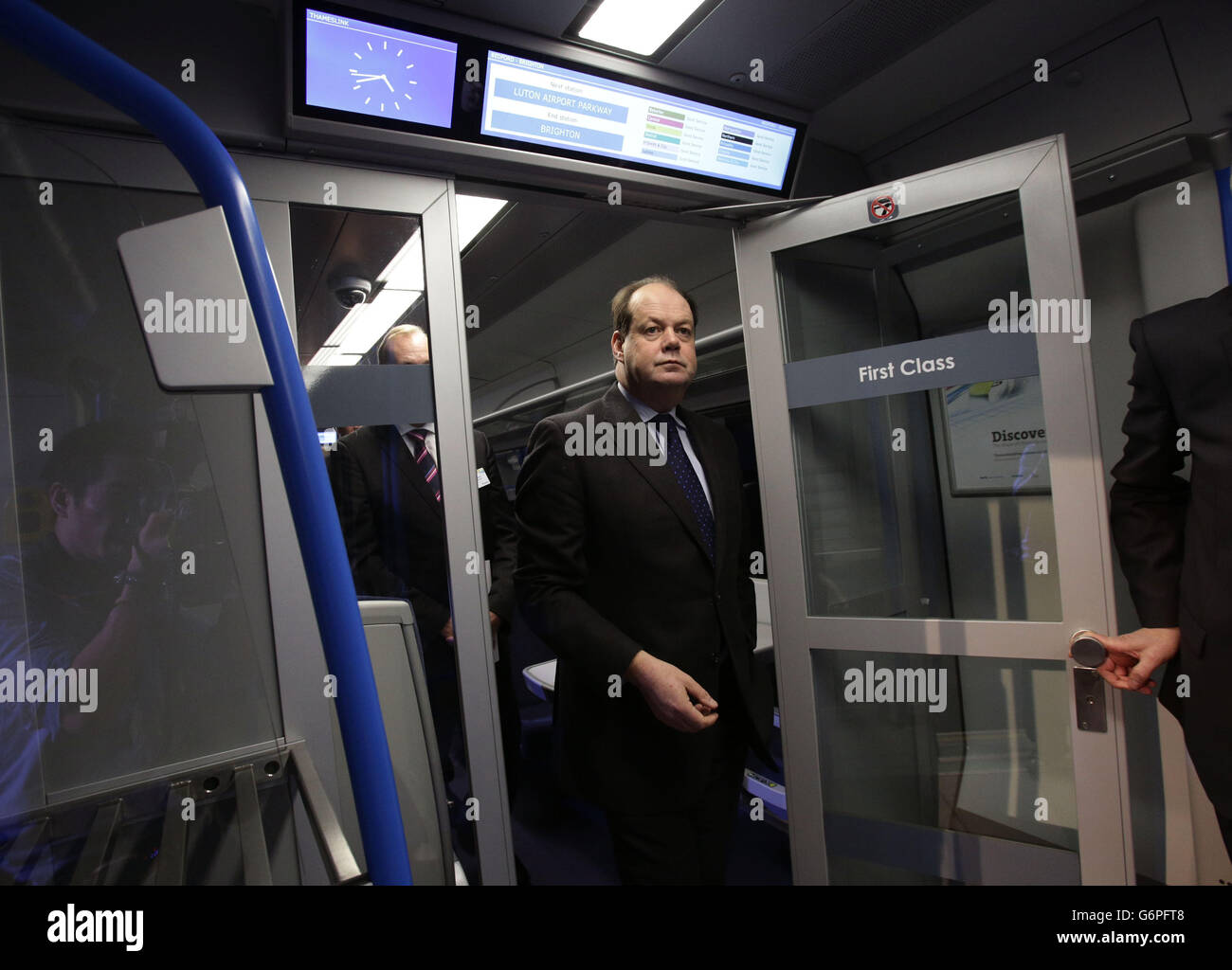Rail Minister Stephen Hammond views a full-scale mock-up of the next ...