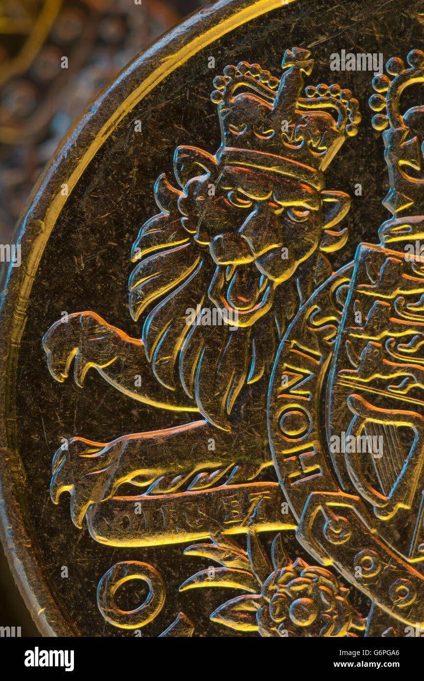 Crowned lion on face of old style old style one pound coin. Concept of ...