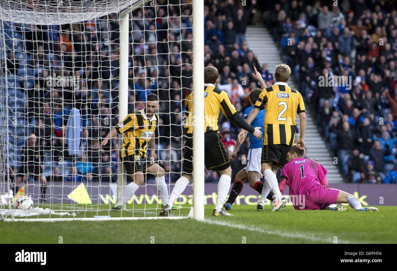 Rangers' Dean Shiels (hidden) scores the opening goal during the ...