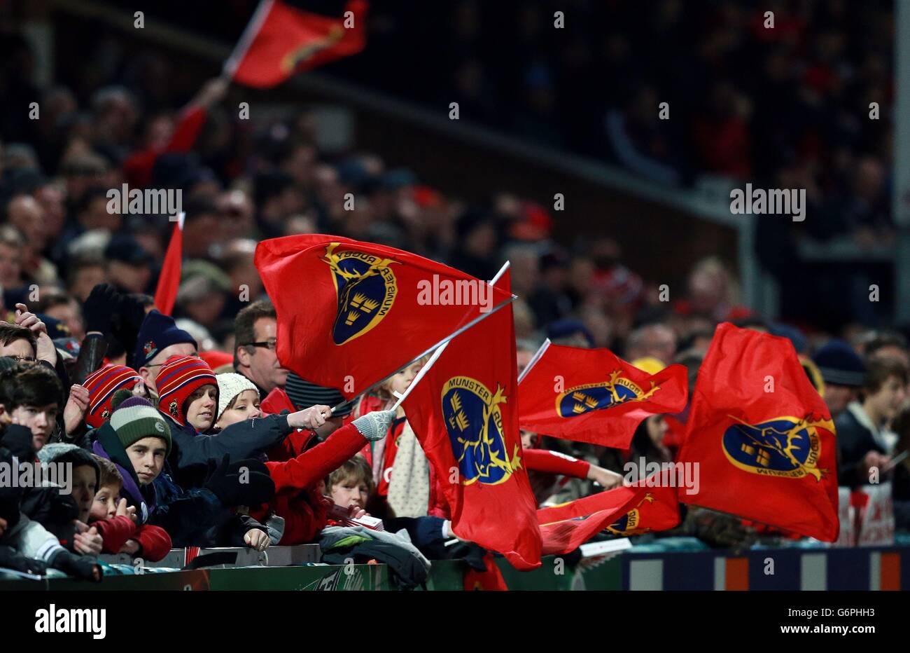 Munster fans wave flags during the heineken cup hi-res stock ...