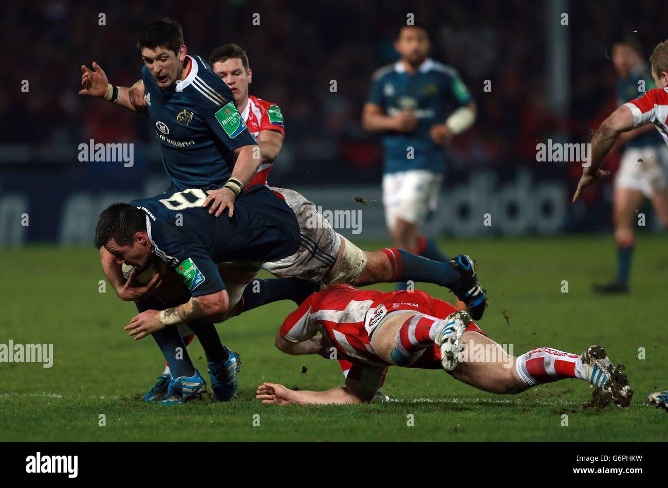 Munster's James Coughlan is tackled by Gloucester's Matt Kvesic during ...