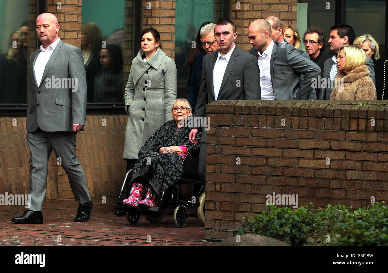 Rolf Harris pushes his wife Alwen in a wheelchair, as he arrives at ...