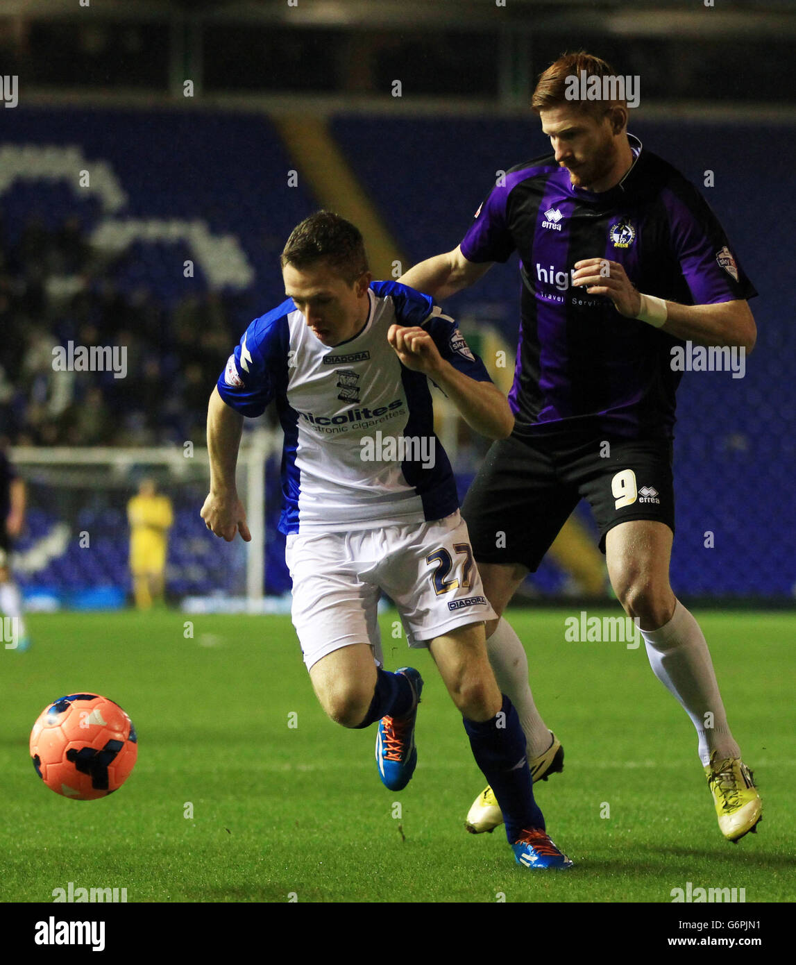 Birmingham City's Shane Ferguson holds off a challenge from Bristol ...