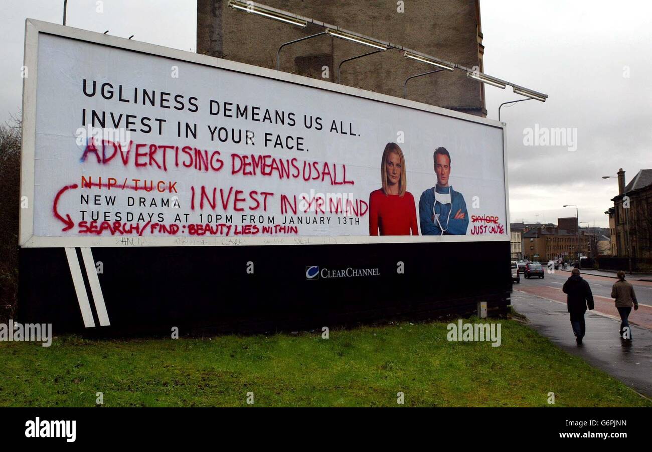 TV advertising poster graffiti Stock Photo - Alamy