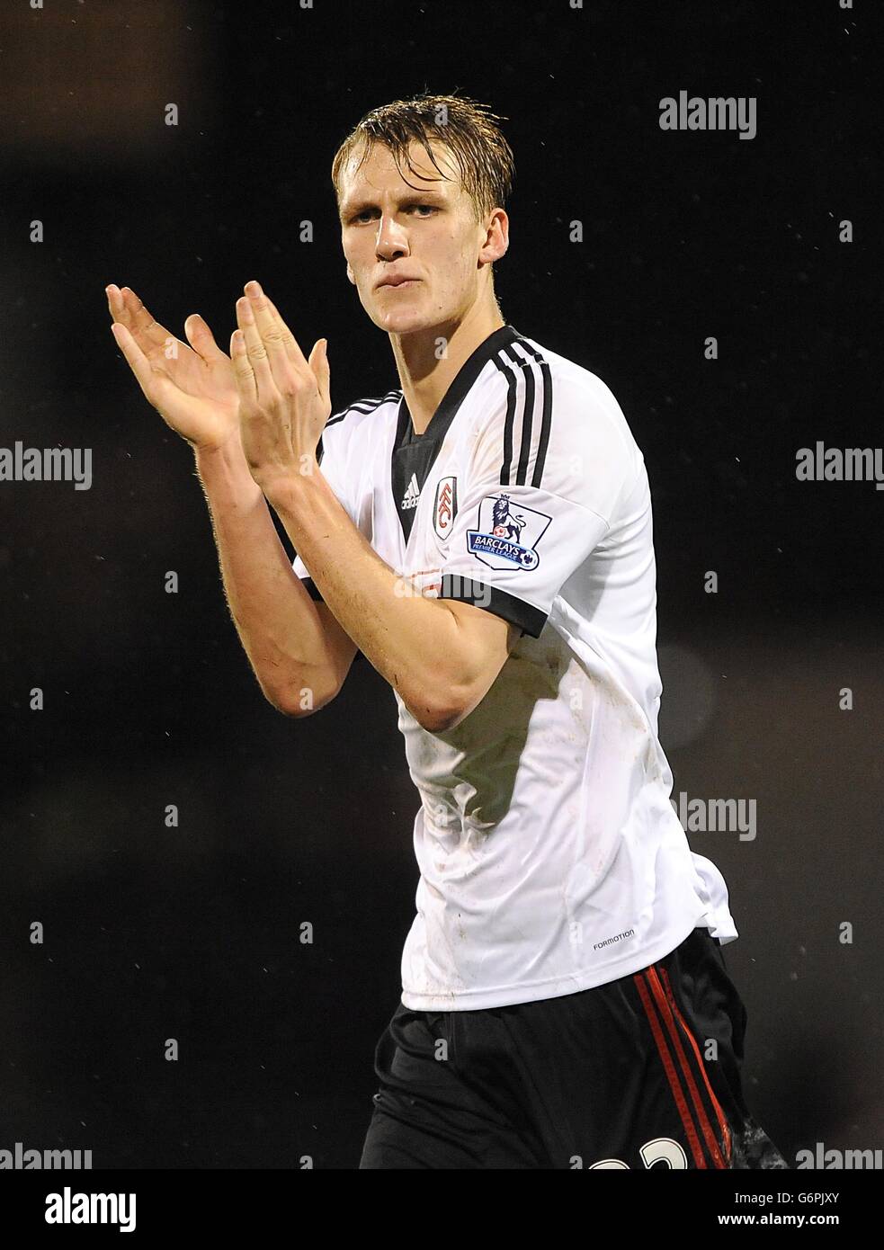 Fulham's Dan Burn applauds the fans after the final whistle Stock Photo ...