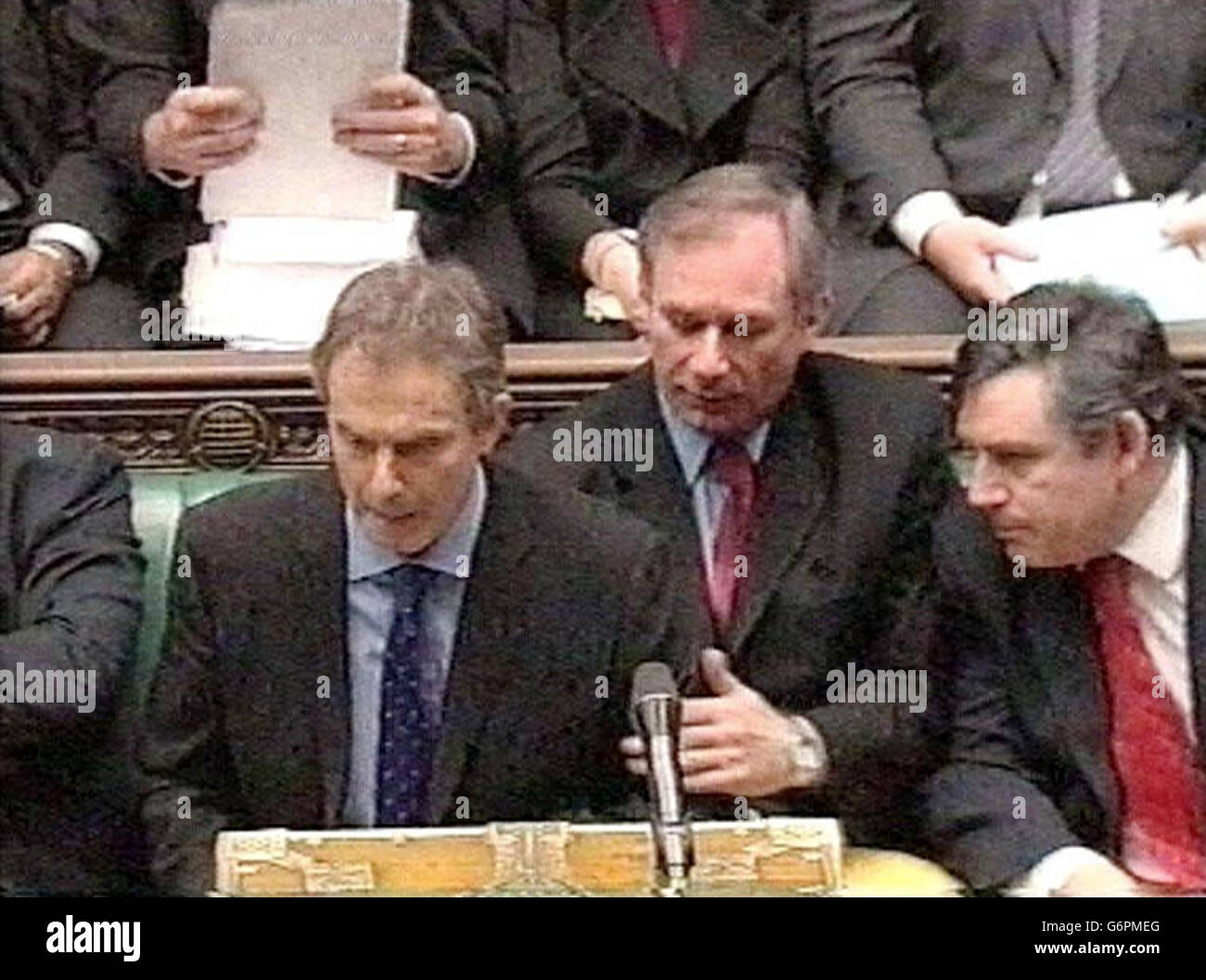 Prime Minister Tony Blair seated in the House of Commons, alongside ...
