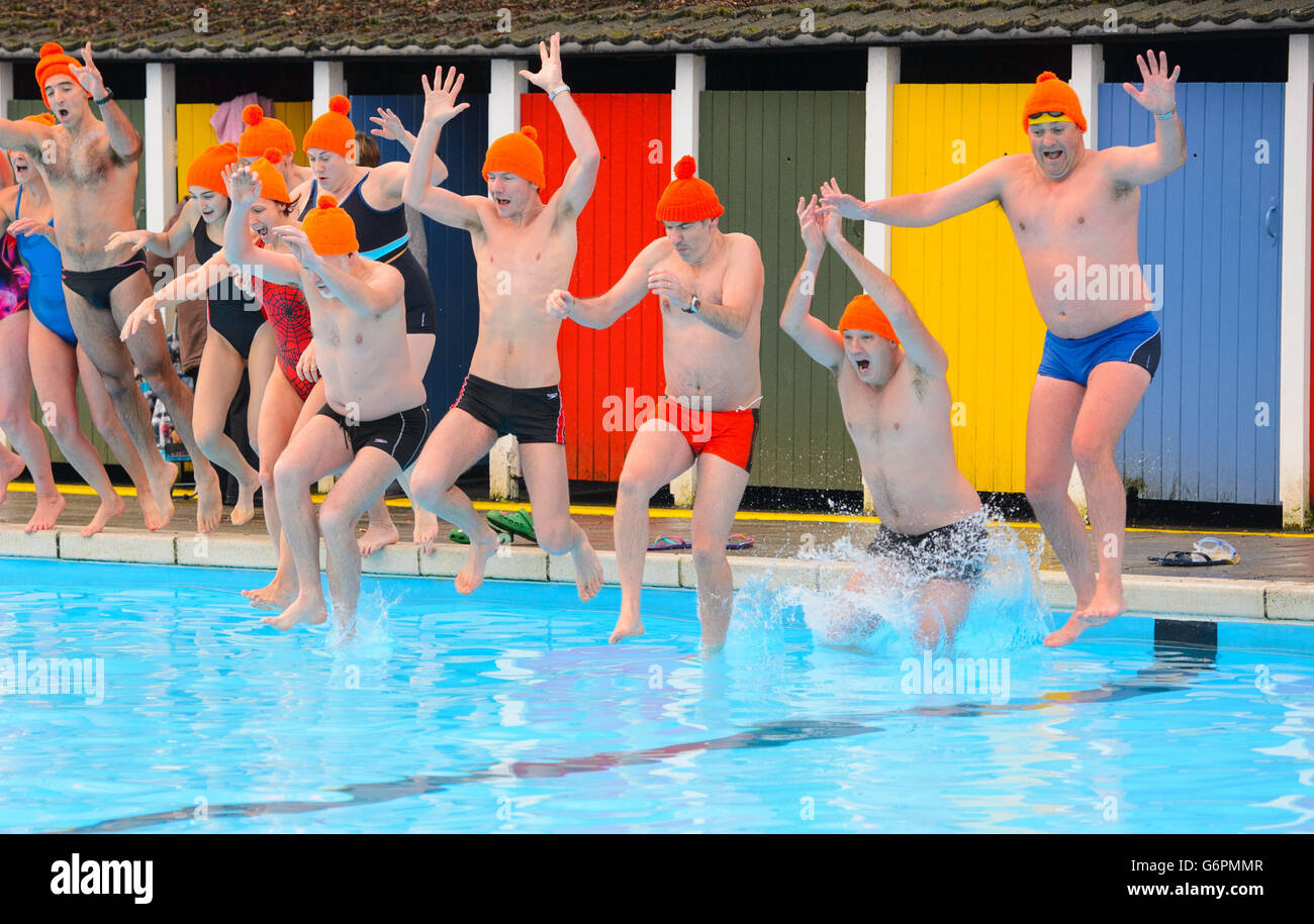 Cold weather swimmers jump in to take a swim at Tooting Bec Lido, in ...