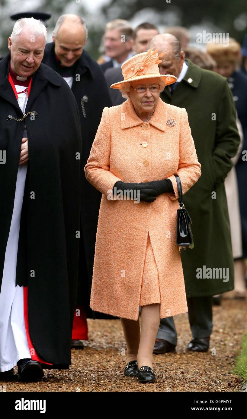 Queen Elizabeth II, alongside the Bishop of Lincoln Christopher Lowson ...