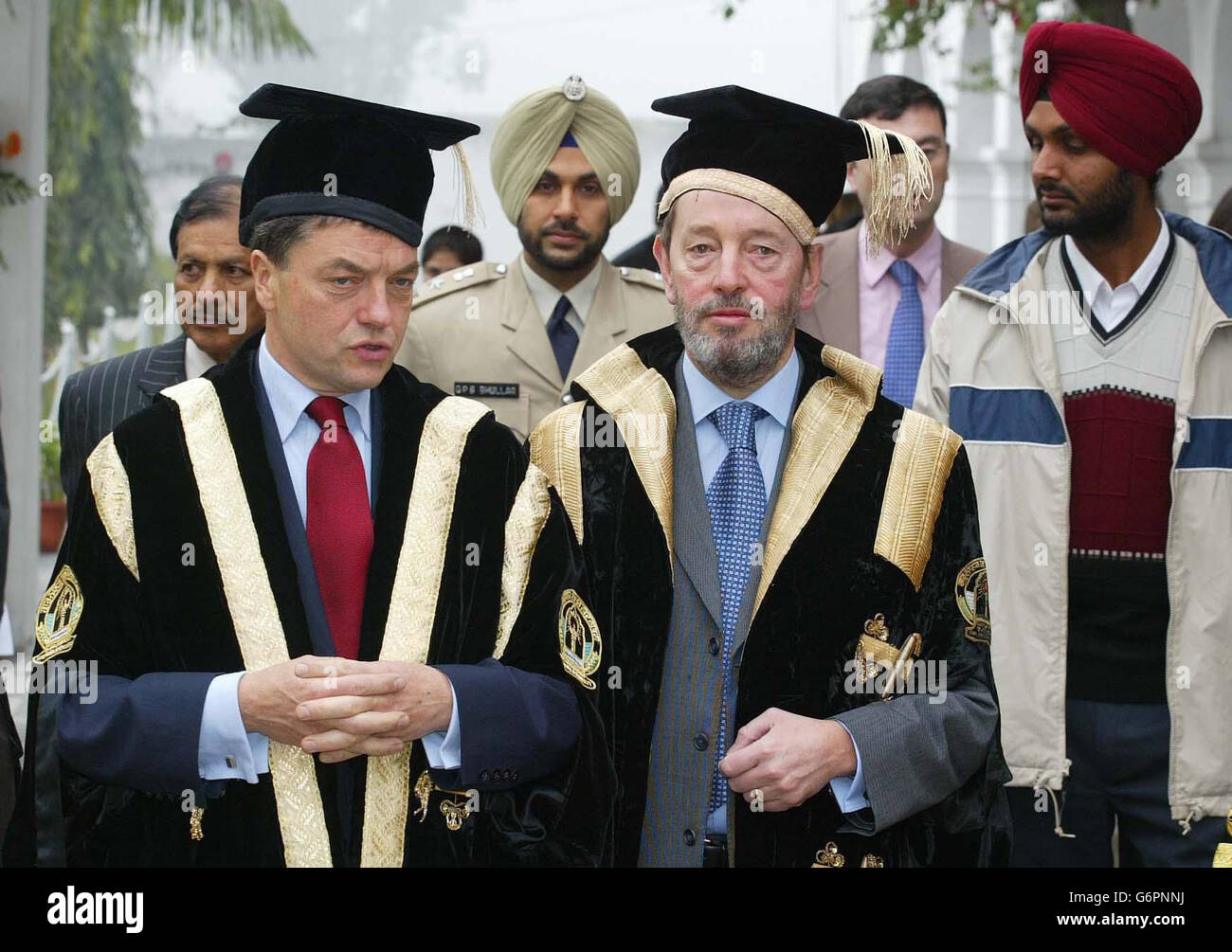 The British High Commissioner Sir Michael Arthur (left) escorts Home ...