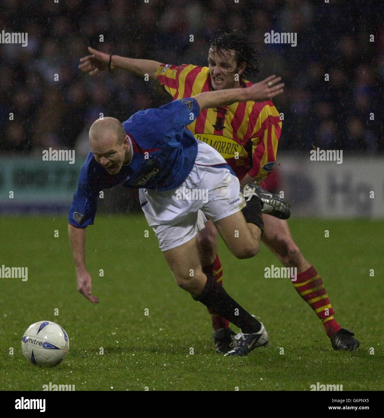 Rangers' Henning Berg challenges Partick Thistle's Gerry Britton during ...