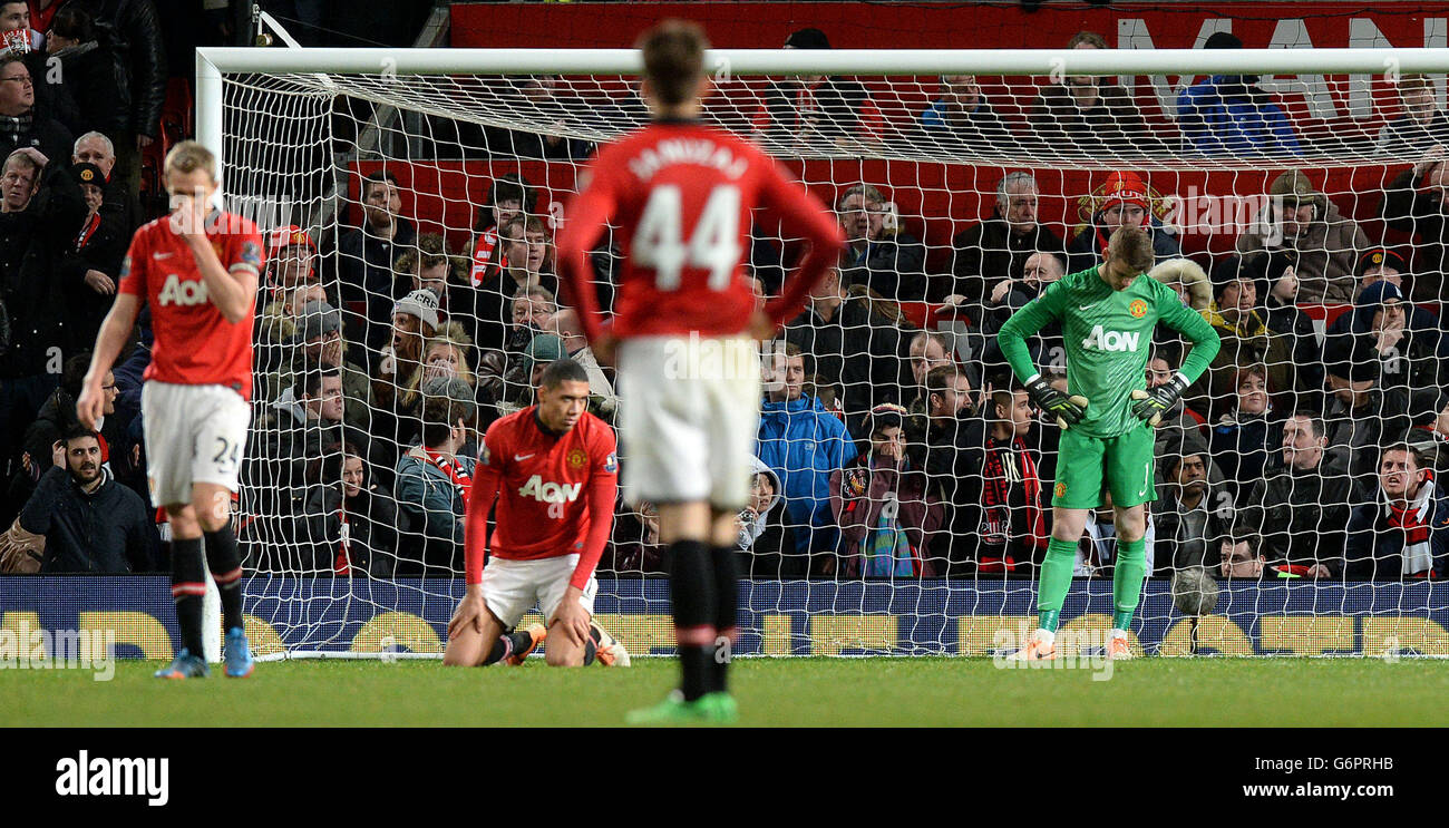 Manchester United's David De Gea shows his dejection after his mistake ...