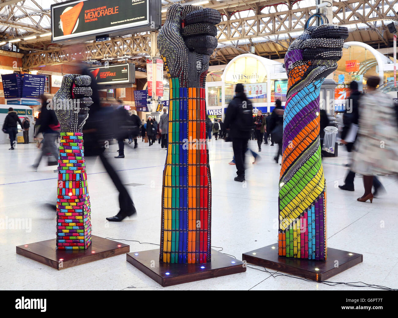 An installation of three arm-shaped sculptures on display at London's ...