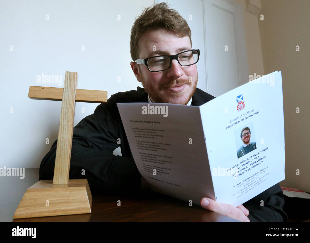 The Rev Michael Mair prepares himself at home in Edinburgh before ...