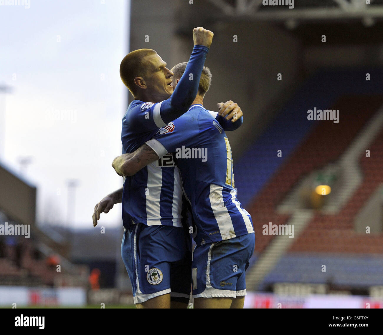 Wigan Athletic's Ben Watson (left) celebrates with team-mate James ...