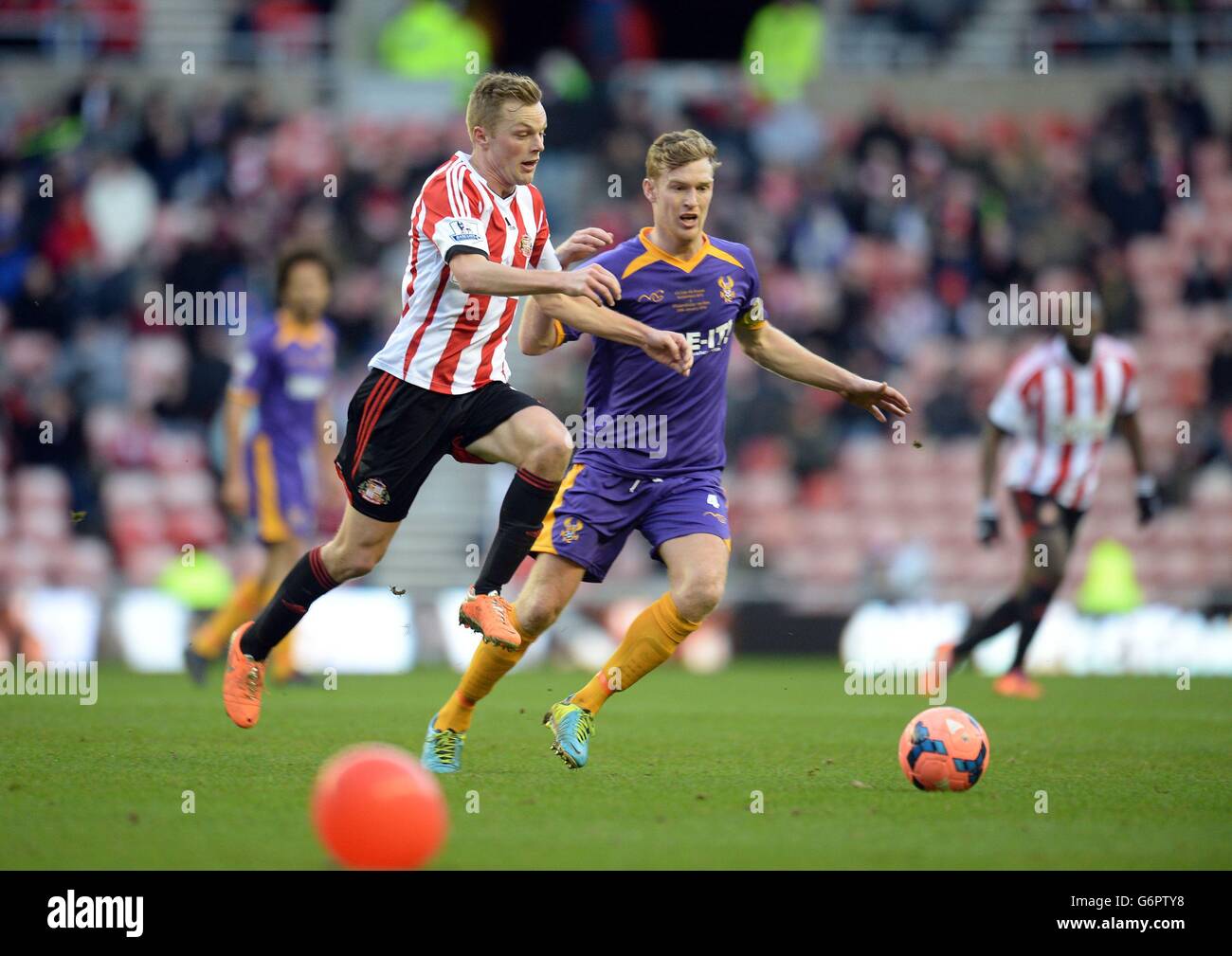 Sunderlands Sebasttian Larsson (left) and Kidderminsters Kyle Storer ...