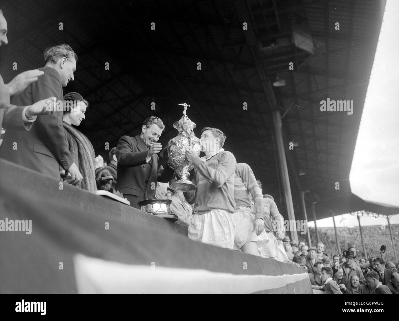 Lord Derby presents the Leeds Captain with the Rugby League Cup, after ...