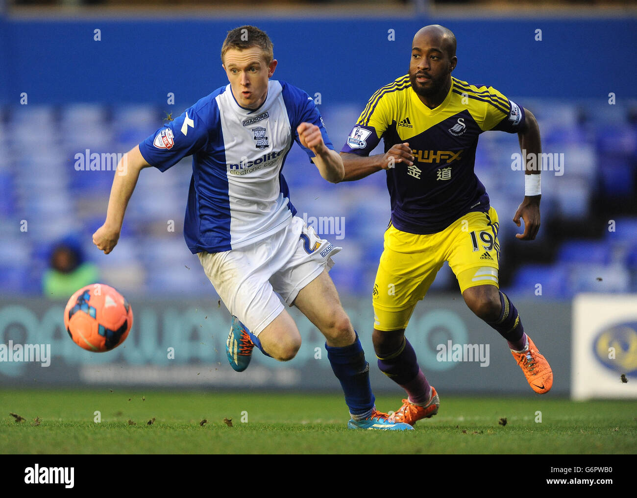 Birmingham City's Shane Ferguson (left) and Swansea City's Dwight ...