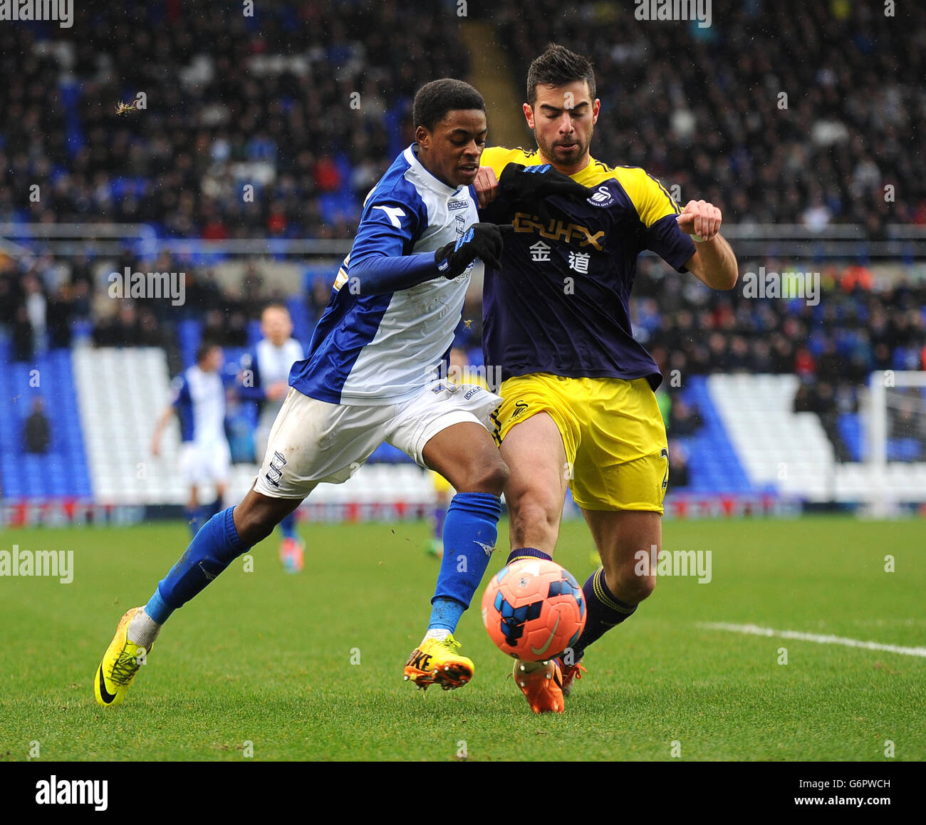 Birmingham City's Reece Brown (left) and Swansea City's Jordi Amat ...