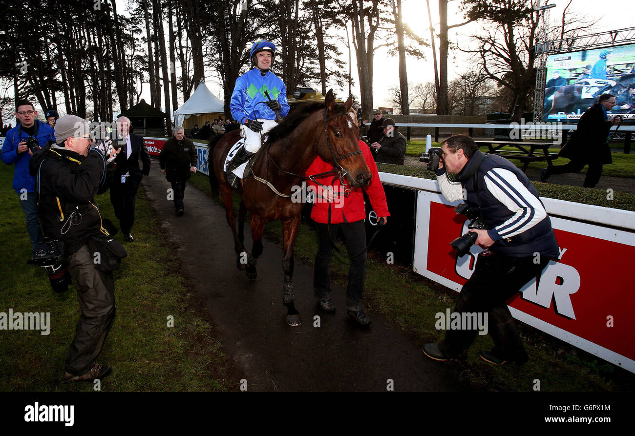 Ruby Walsh enters the parade ring aboard Hurricane Fly after winning ...